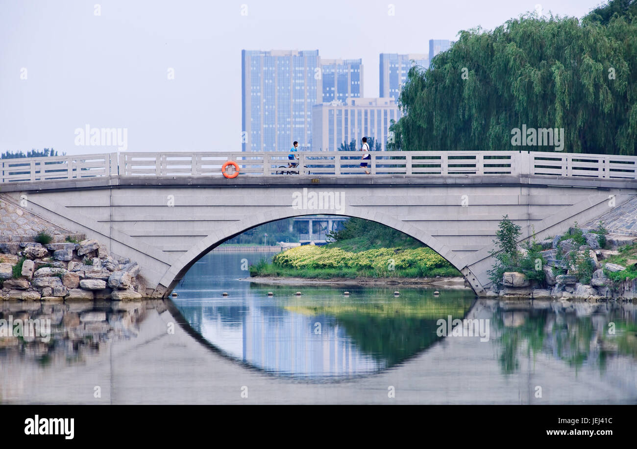 BEIJING-JULY 6, 2015, Bridge in Niantan Park at dawn. The park in ...