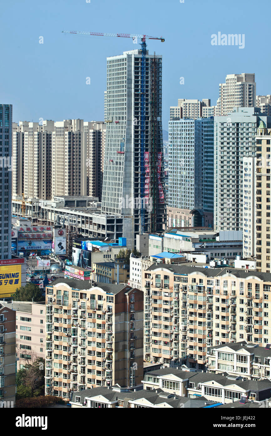 DALIAN-NOV. 1. Cityscape of Dalian, skyscraper under construction. With ...