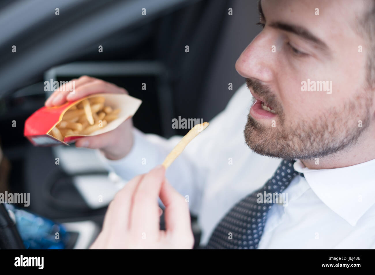Man eating junk food hi-res stock photography and images - Alamy