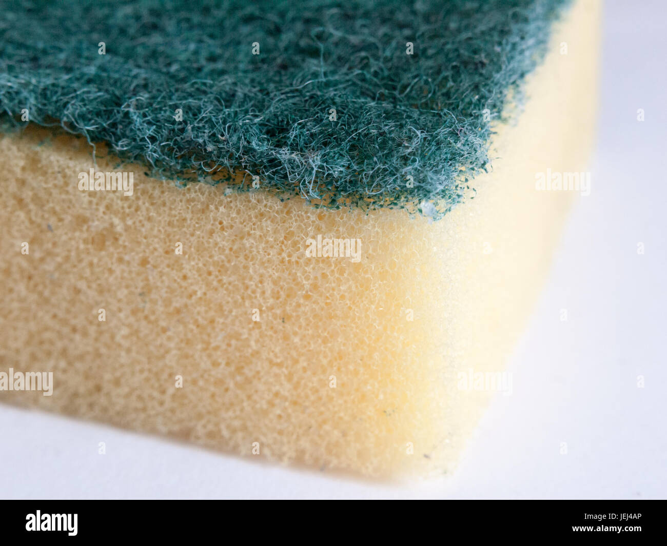 yellow and green detail texture of the edge of a scouring pad for ...