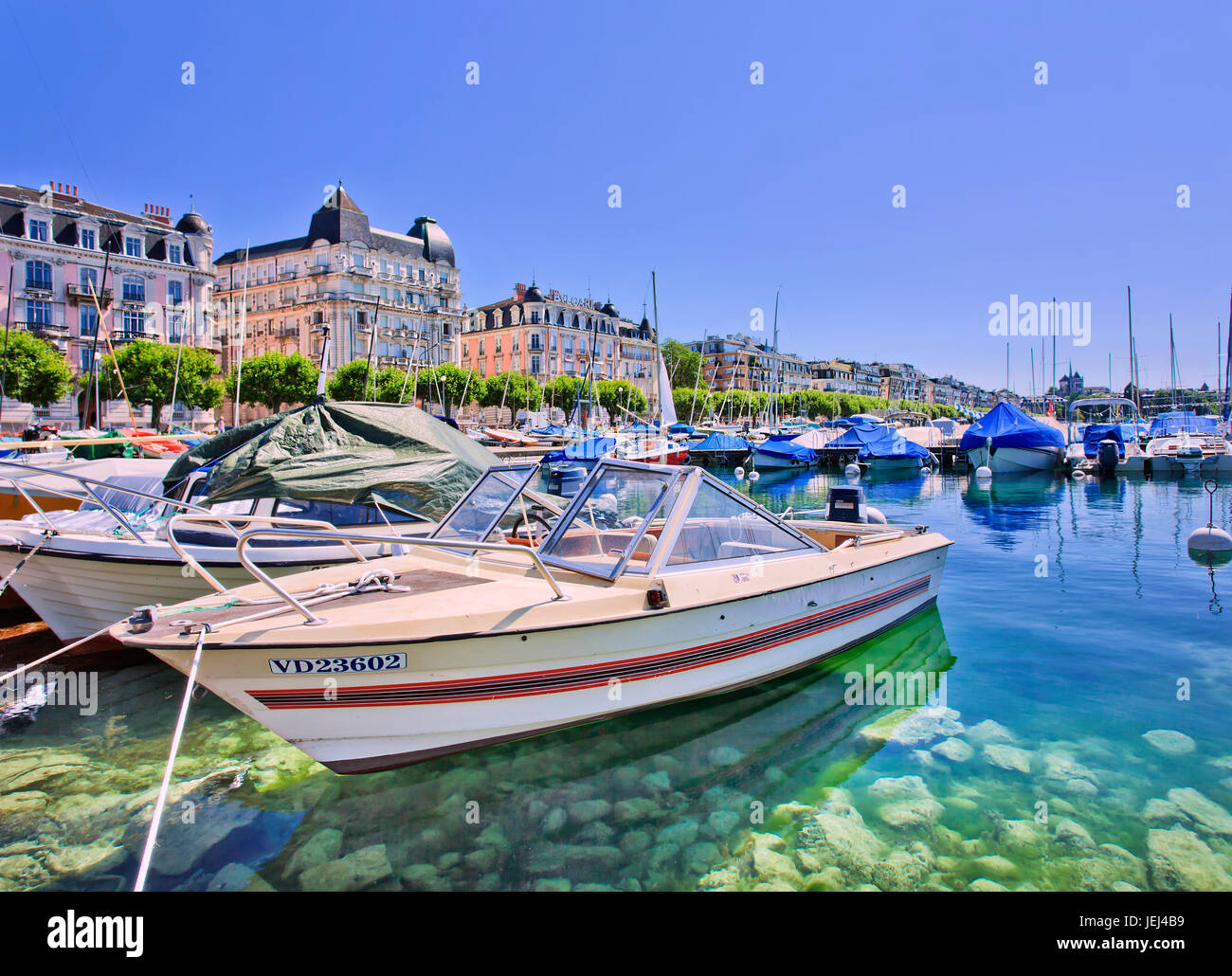GENEVA–JULY 25, 2011. Luxurious yachts anchored at Lake Geneva. The ...