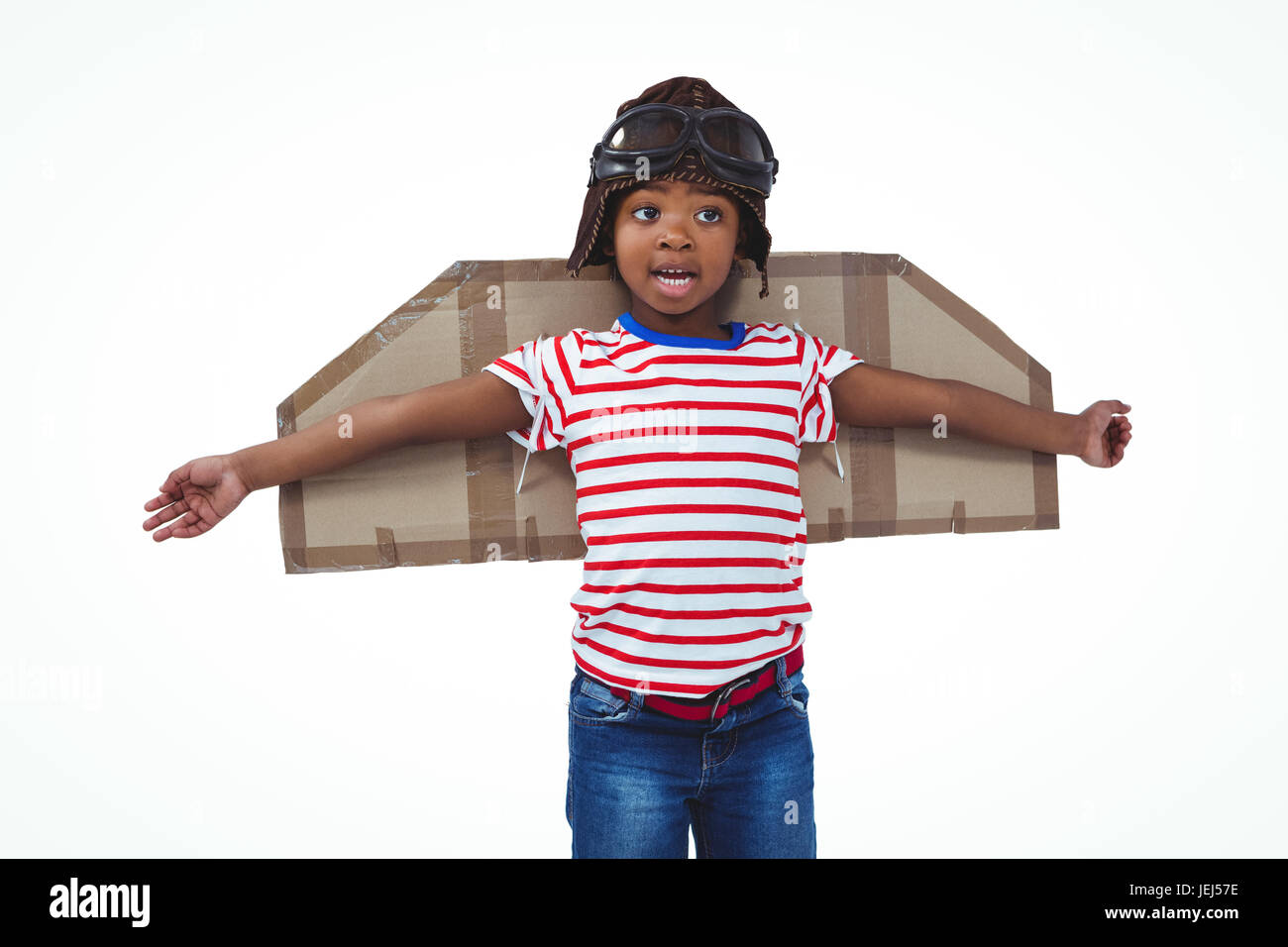 Smiling boy pretending to be pilot Stock Photo - Alamy