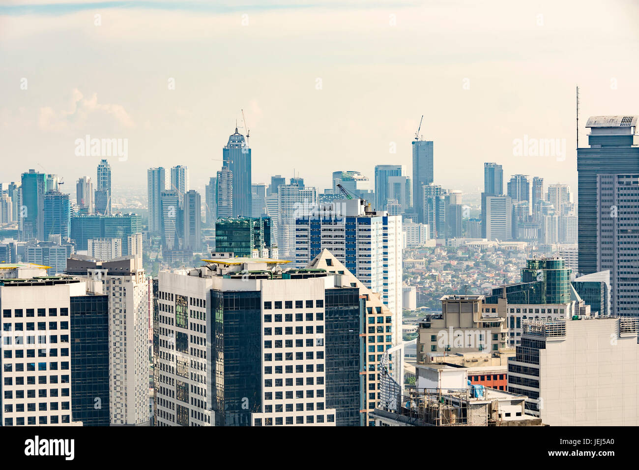 Mix of old and modern urban buildings in Makati City, Manila ...