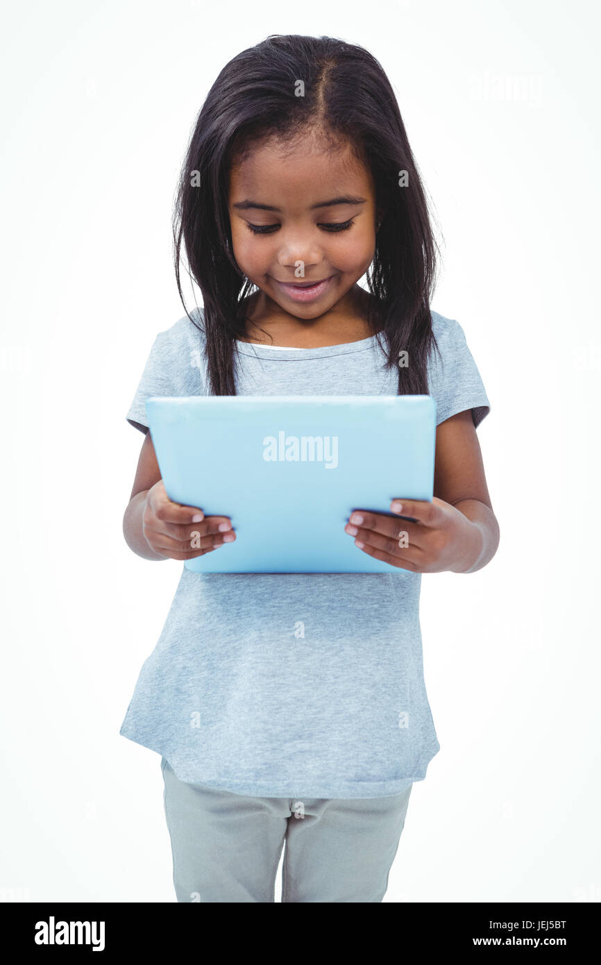 Standing girl using tablet Stock Photo - Alamy