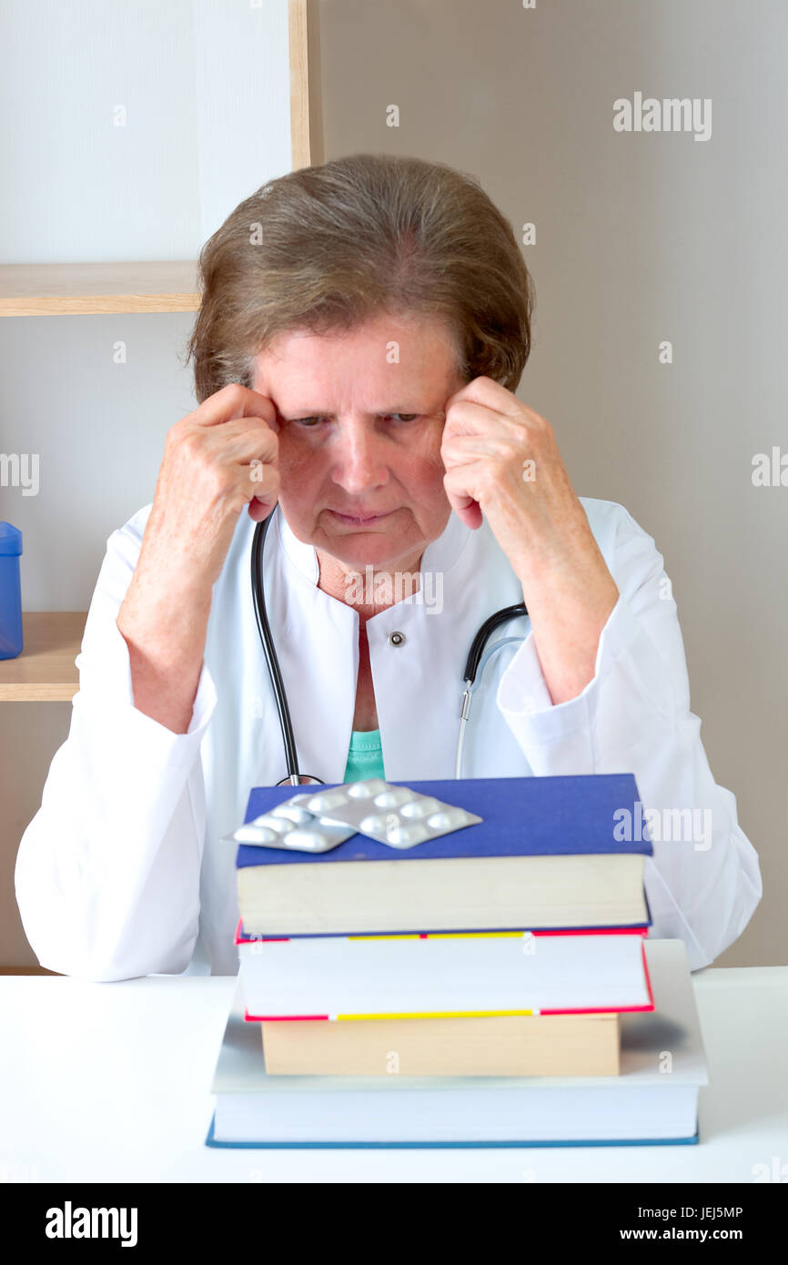 Sad doctor with problems Stock Photo - Alamy