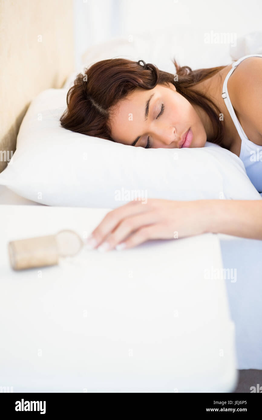 Sleepy woman in her bed Stock Photo - Alamy