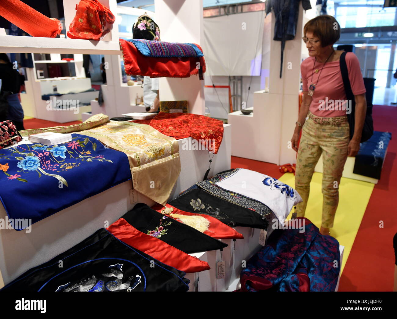 Lisbon, Portugal. 25th July, 2017. A visitor watches handicraft works ...