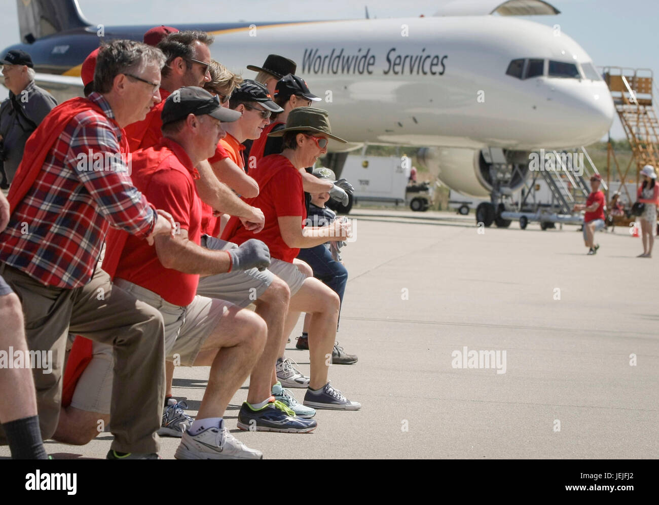 Vancouver, Canada. 25th June, 2017. People warm up before pulling the ...