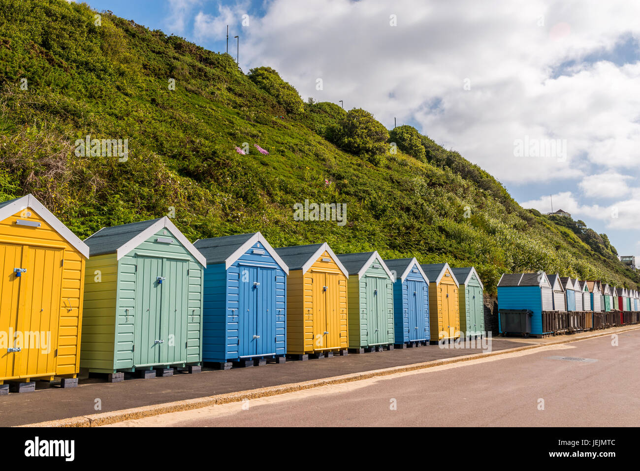 Colored houses on the beach, colorful door to summer cottages, seaside ...
