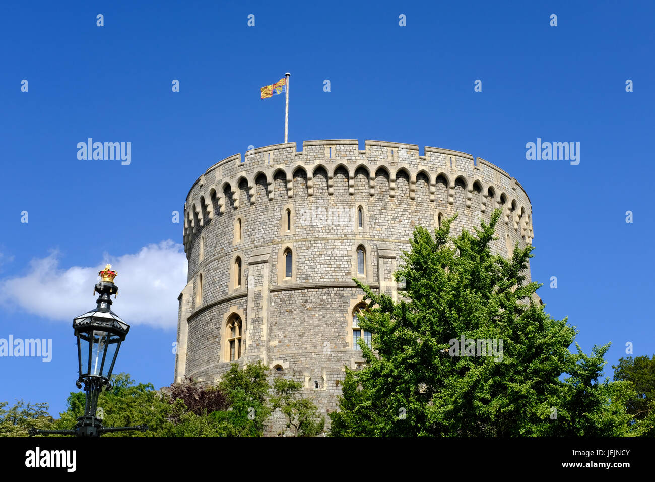 Windsor Castle with Queen's Flag Flying and crowned lampost Stock Photo ...