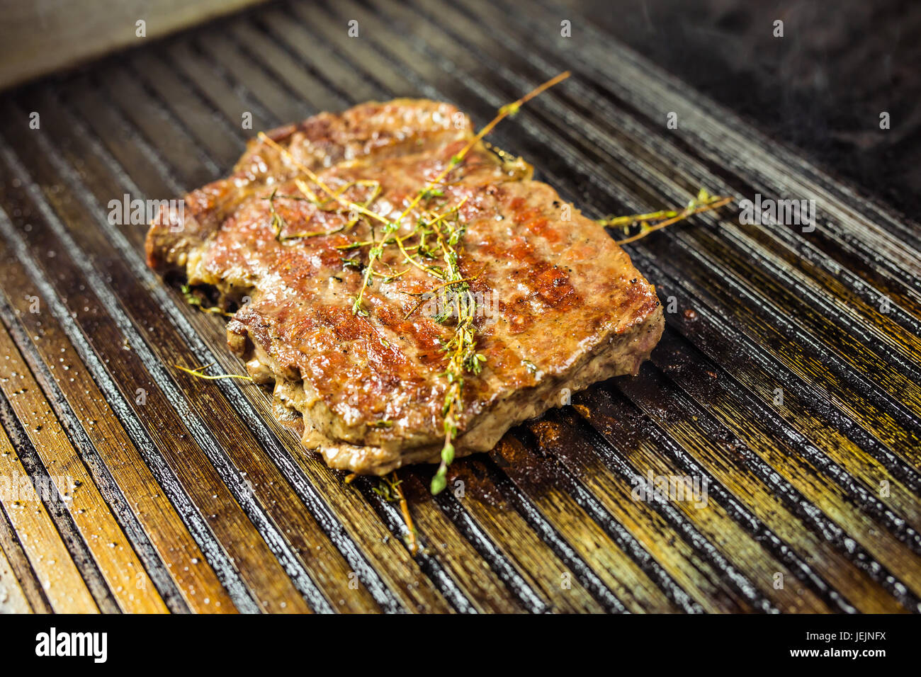 Grilled meat. Juicy steak from beef - soft focuse Stock Photo - Alamy
