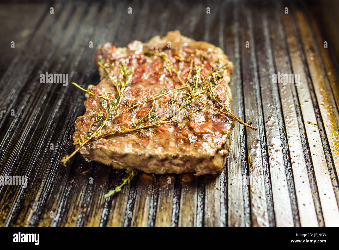closeup of a steak on grill Stock Photo - Alamy