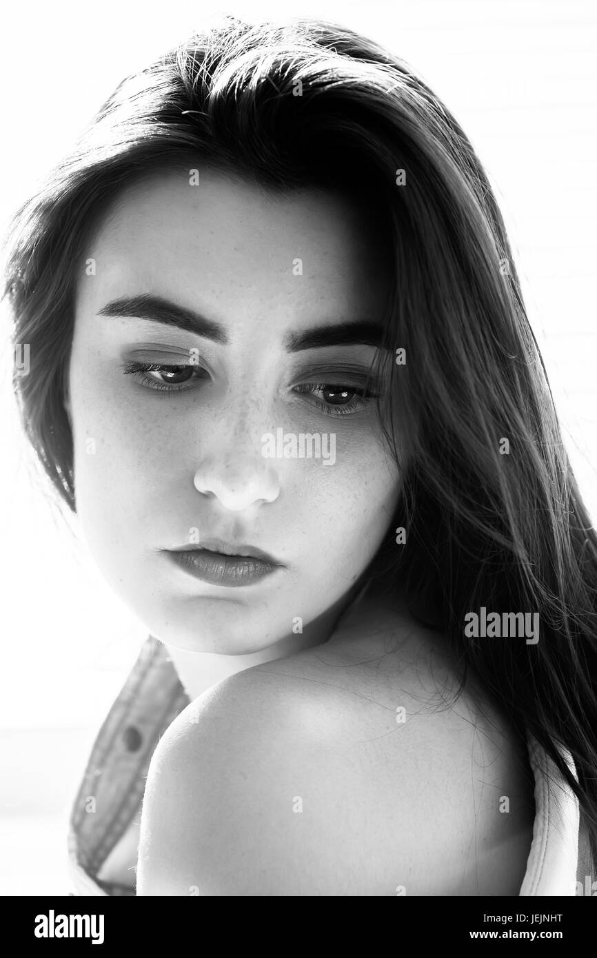 sensual sad female portrait with near window, monochrome Stock Photo ...