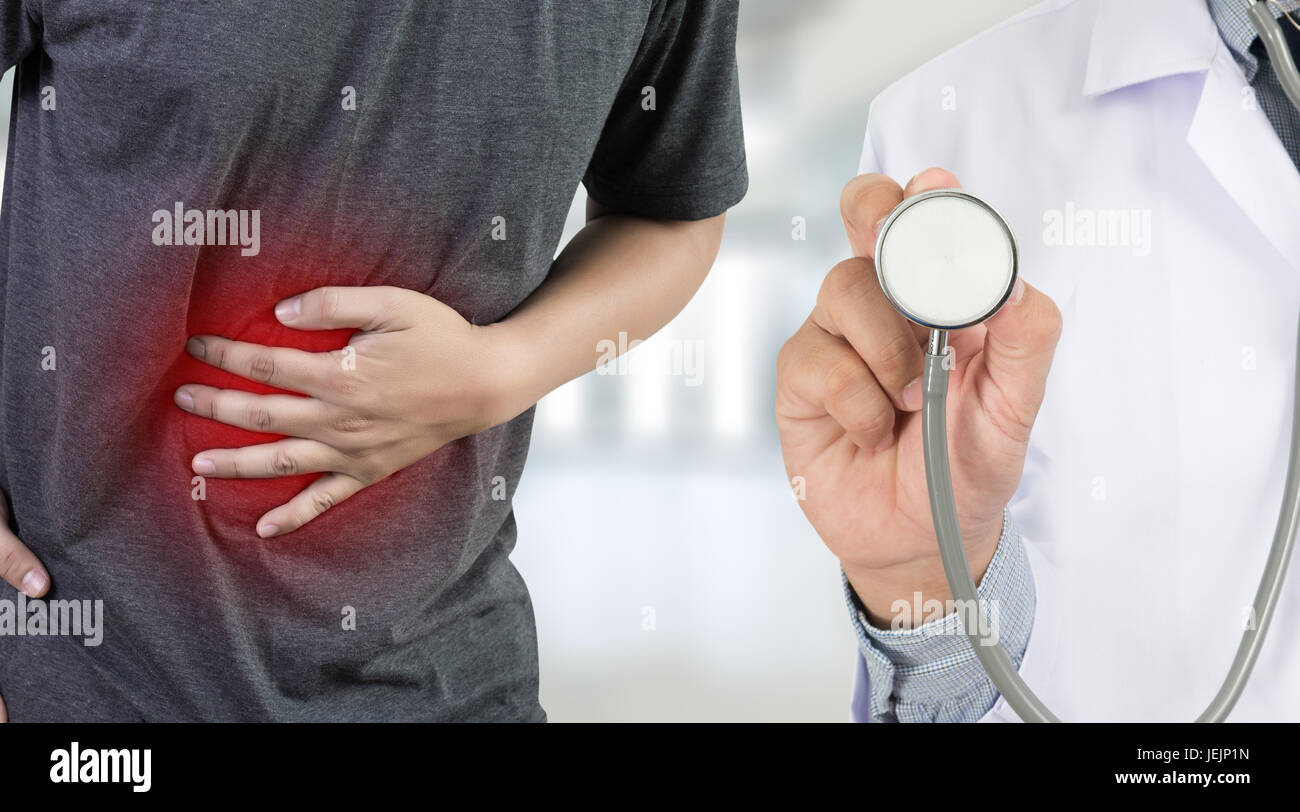 Ache man suffering with back pain backache Pain relief Stock Photo - Alamy