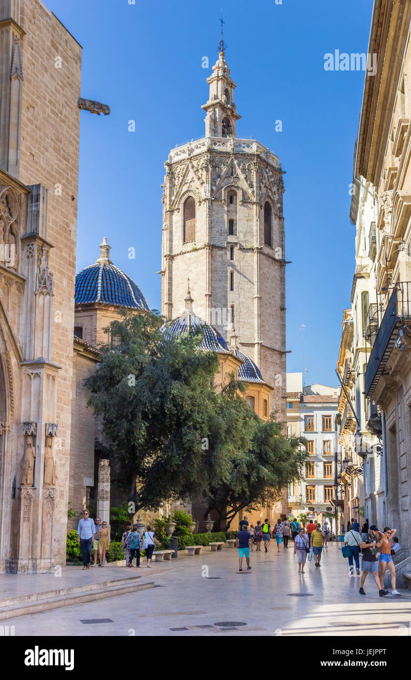 Tower and blue tiled domes of the historic cathedral in Valencia city ...
