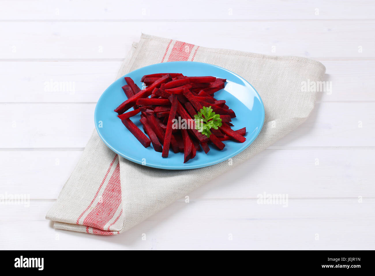 plate of beetroot strips on folded place mat Stock Photo - Alamy