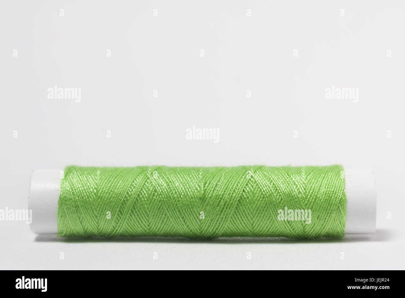 Cotton thread green Stock Photo - Alamy