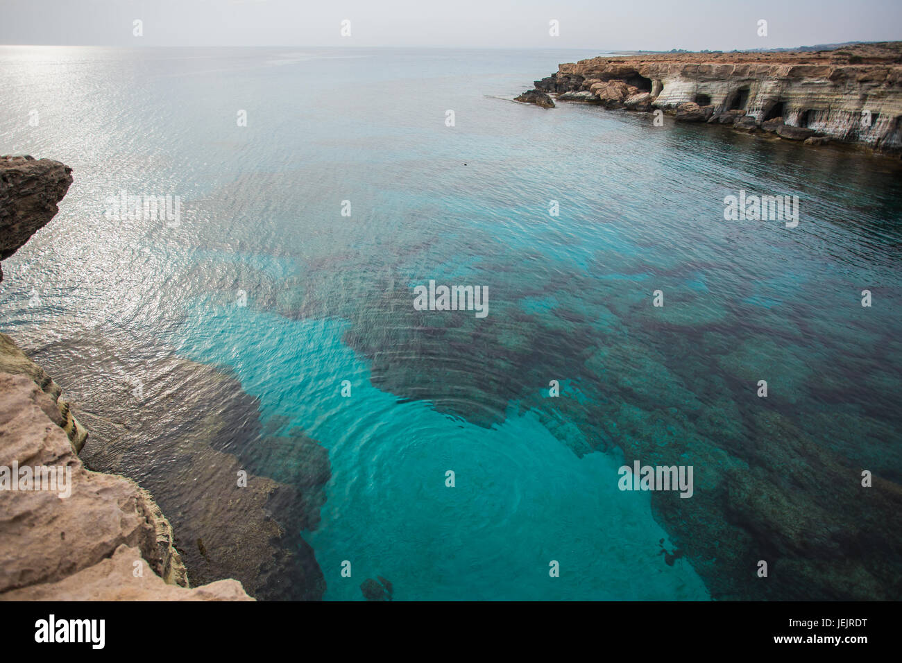 Rock cliffs and sea bay with azure water near Protaras, Cyprus island ...