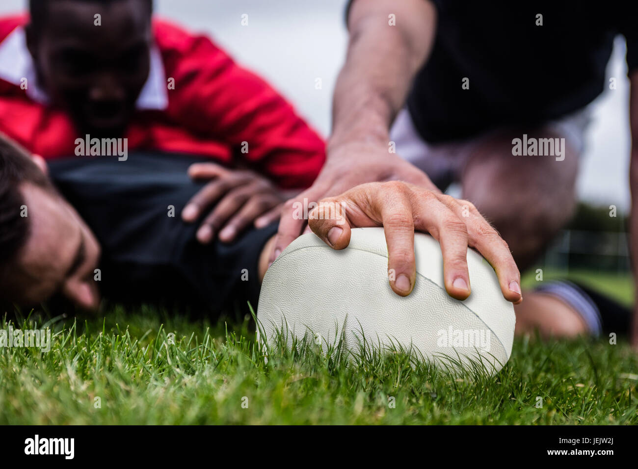 Rugby player scoring a try Stock Photo - Alamy