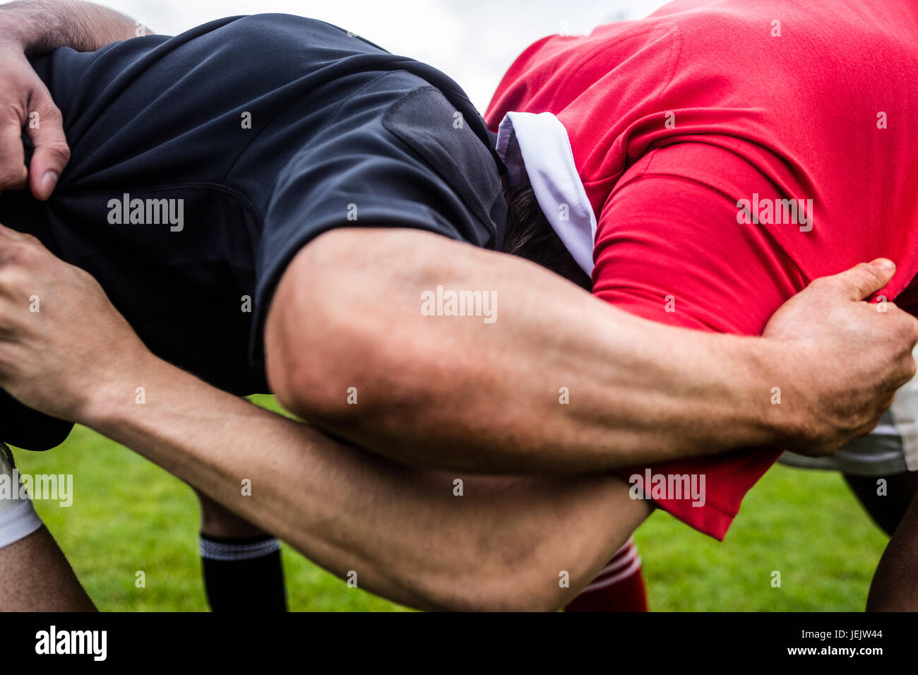 Rugby players doing a scrum Stock Photo - Alamy