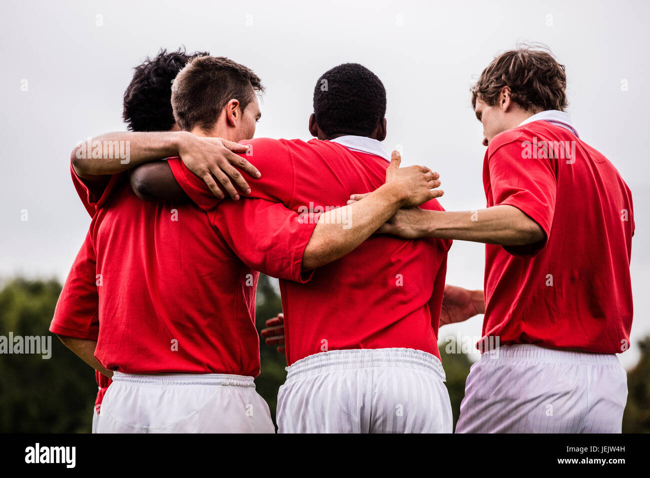 Rugby players celebrating a win Stock Photo - Alamy