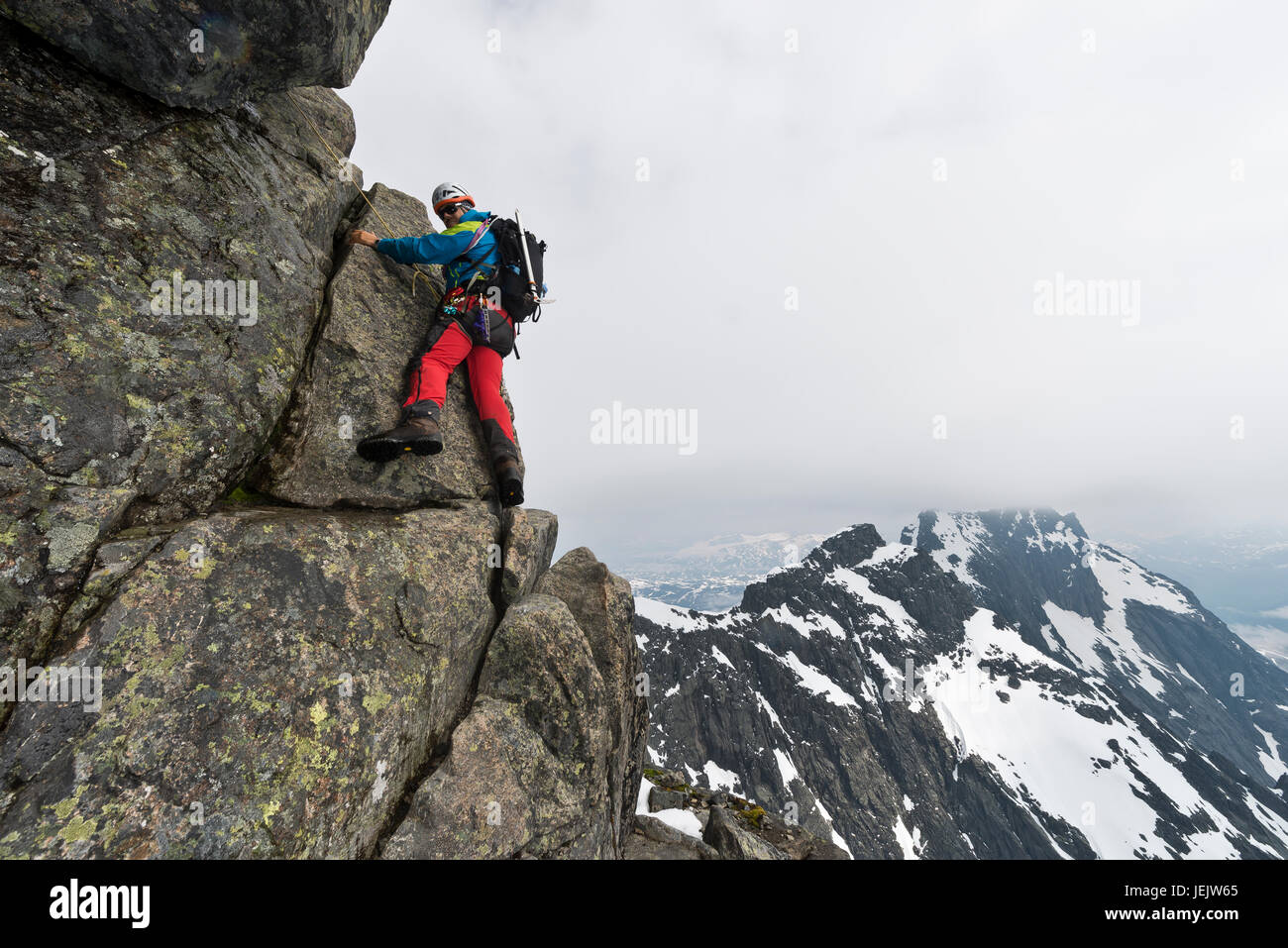 Man looking down mountain face hi-res stock photography and images - Alamy