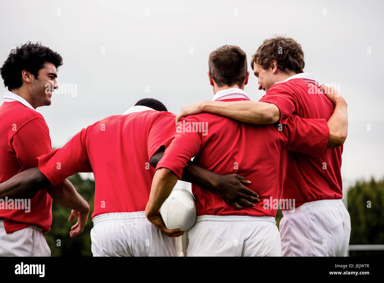 Rugby players celebrating a win Stock Photo - Alamy