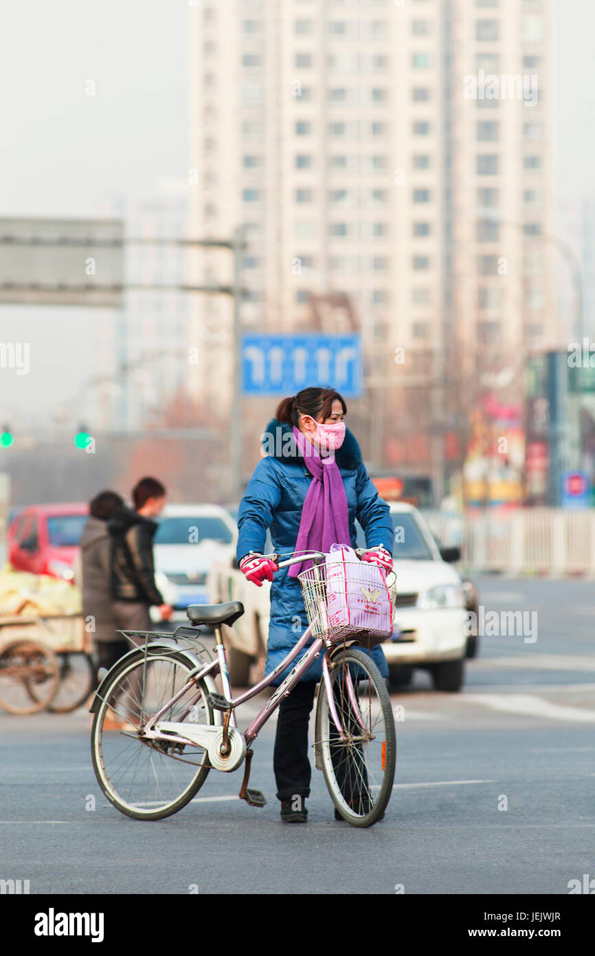 BEIJING-DEC. 4. Resident with smog protection. In January 2013 Beijing ...