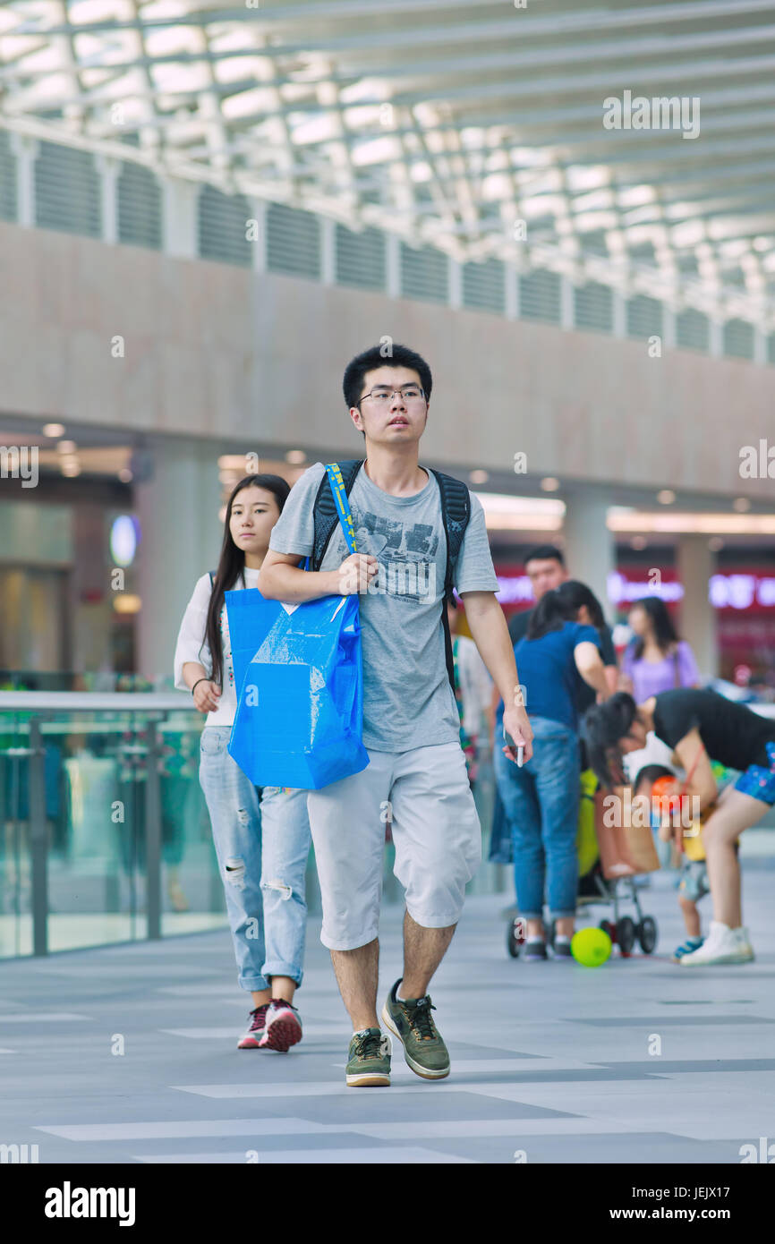 BEIJING-AUG. 2, 2015. Shoppers at Livat shopping mall. Owned by Inter ...
