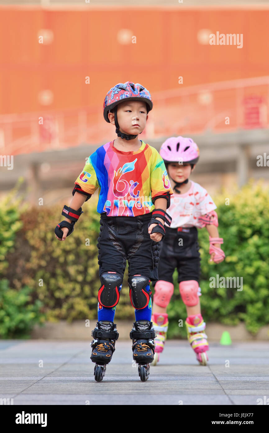 Roller skating kids china hi-res stock photography and images - Alamy