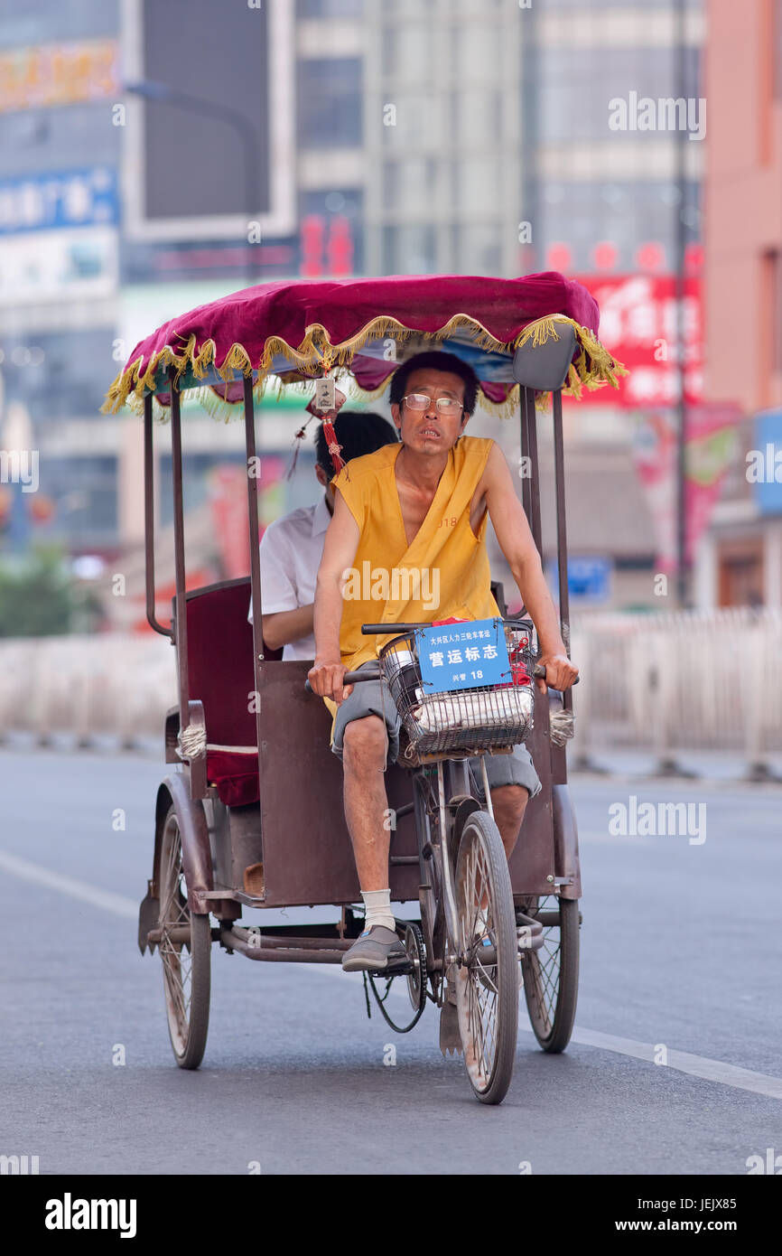 China rickshaw driver hi-res stock photography and images - Alamy