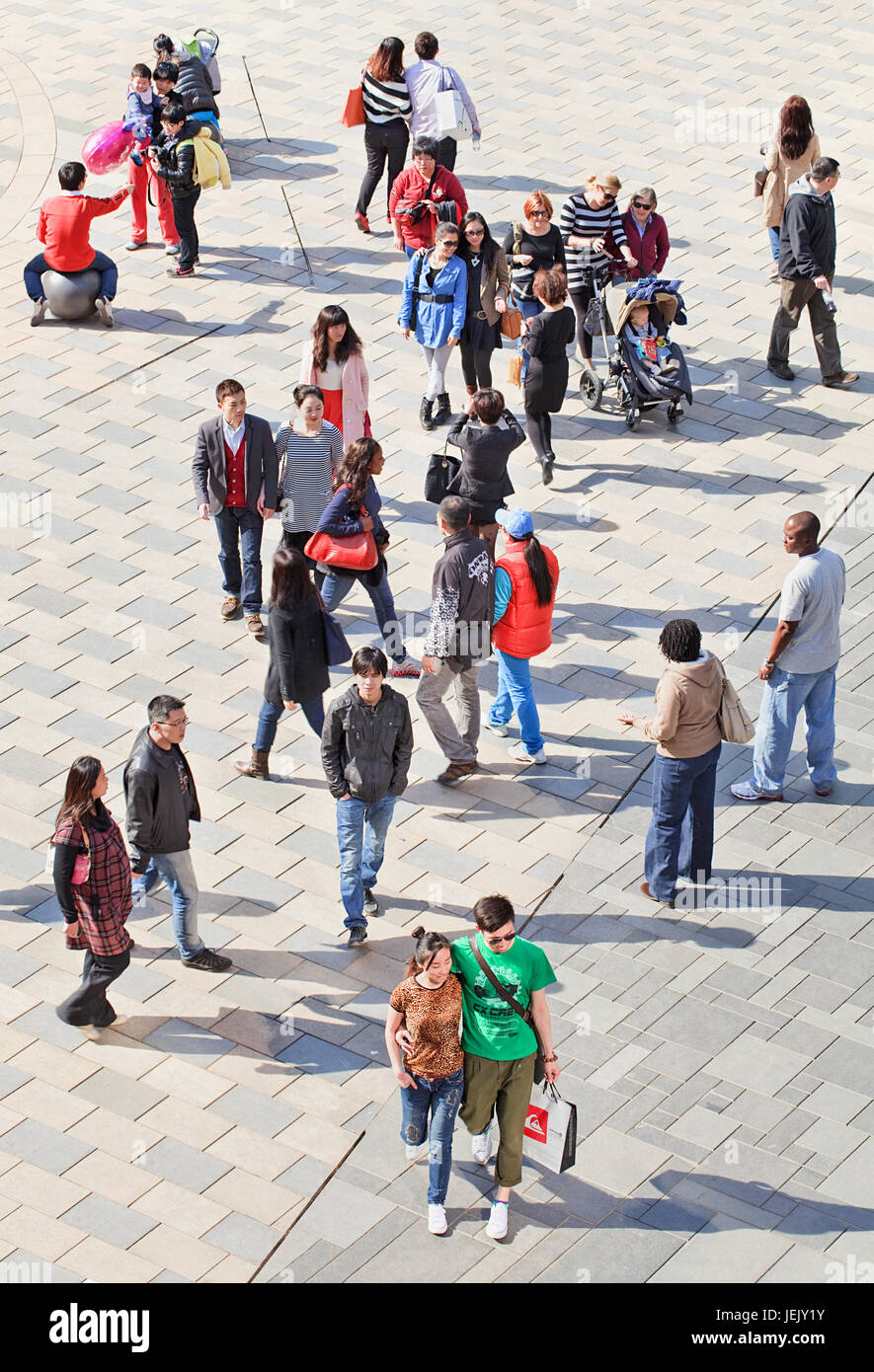 BEIJING-APRIL 4. Chinese and foreigners. 593,832 foreigners were living ...