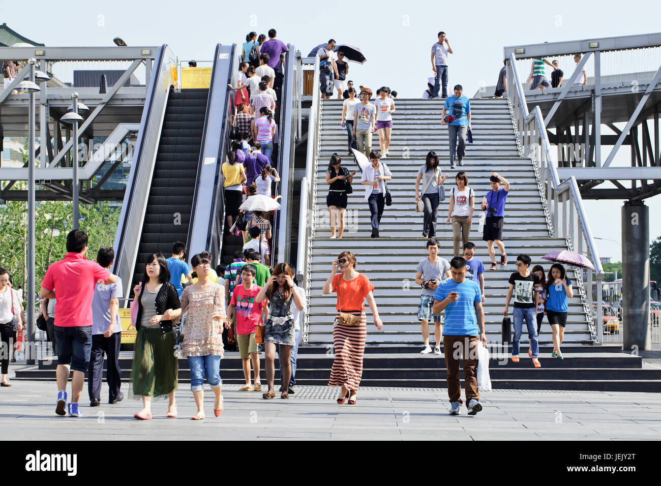 BEIJING–JUNE 5, 2012. Pedestrian bridge in Beijing Xidan shopping area ...