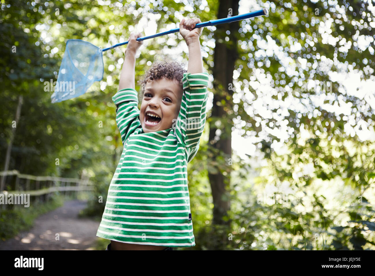 Boy with net hi-res stock photography and images - Alamy