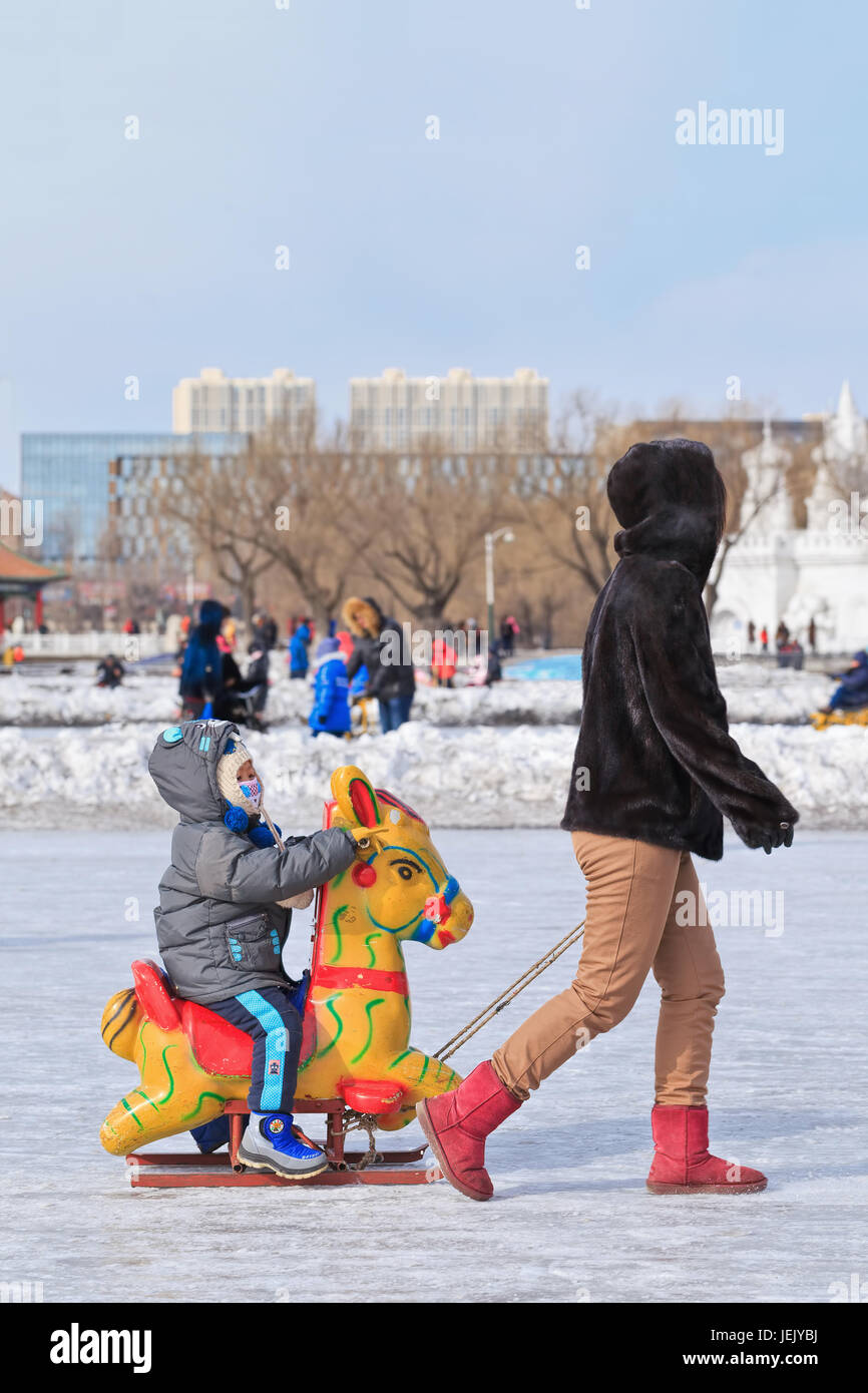 CHANGCHUN – FEBR. 4; 2014. People have fun on the ice in Nanhu Park ...