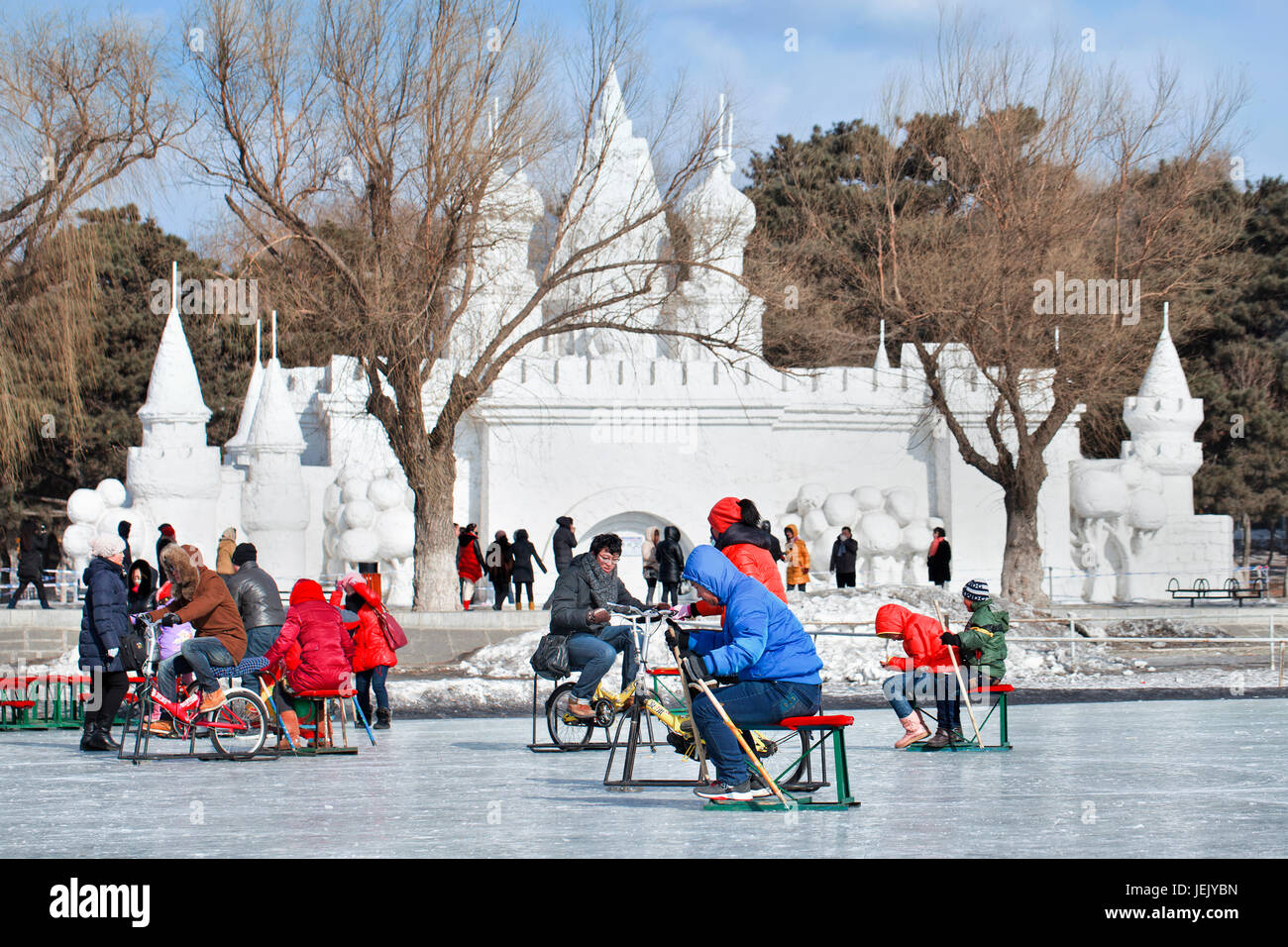 CHANGCHUN – FEBR. 4, 2014. People have fun with sledging on the ice in ...