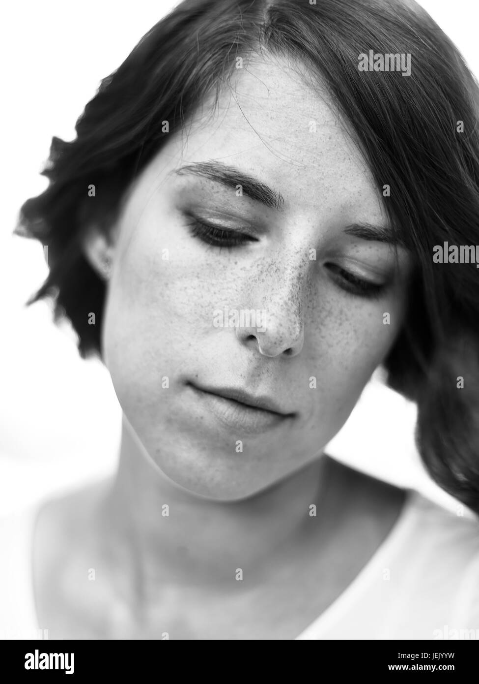 Portrait of young woman with freckles Stock Photo - Alamy