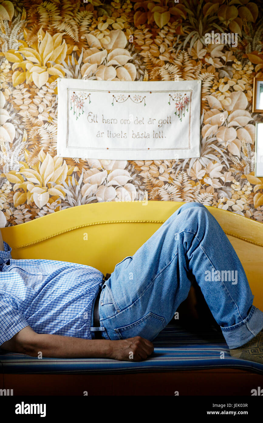 Man lying down on bed hi-res stock photography and images - Alamy