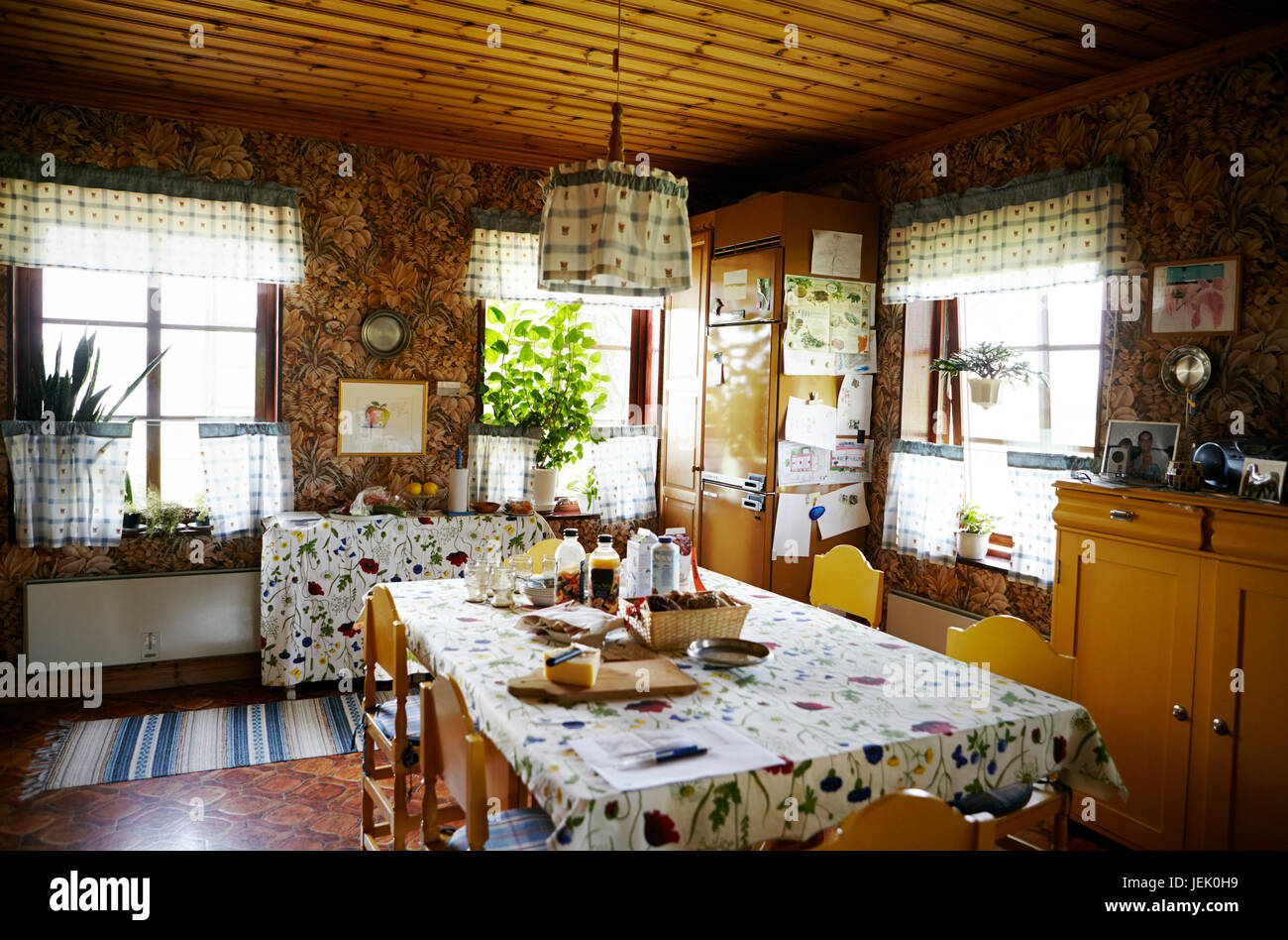 Dining table in kitchen Stock Photo - Alamy