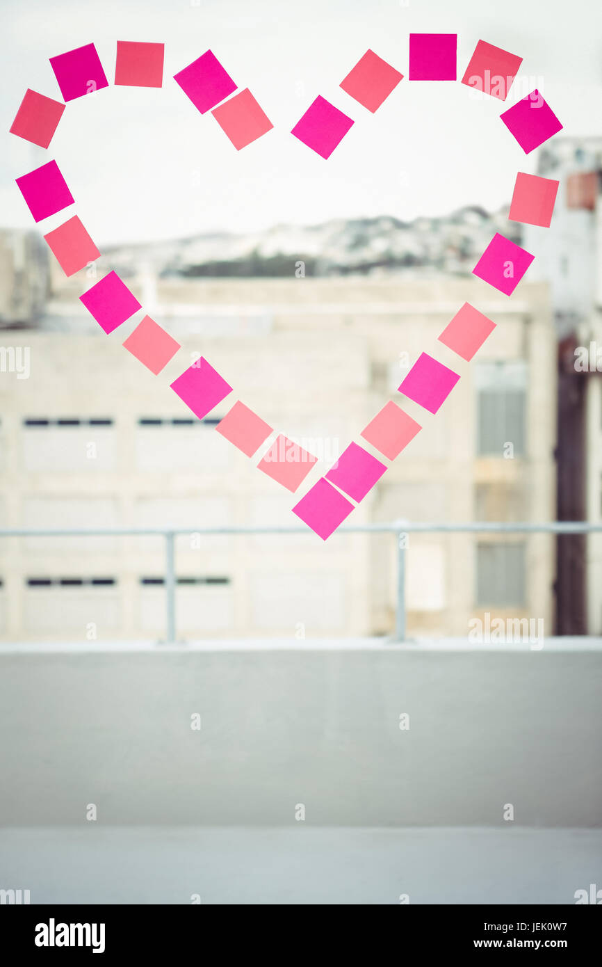 Heart in post-it on a window Stock Photo - Alamy