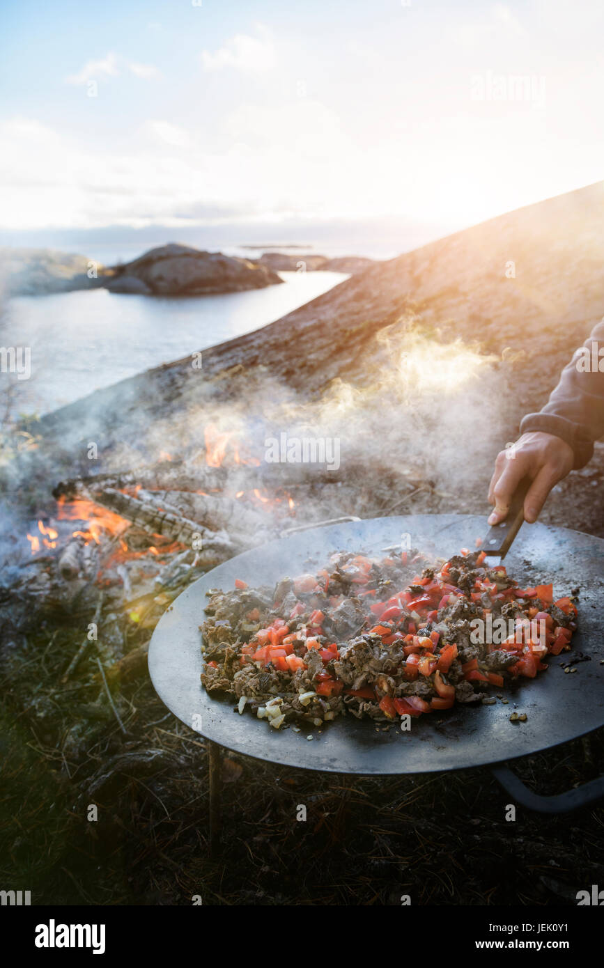 Preparing food outdoor Stock Photo - Alamy