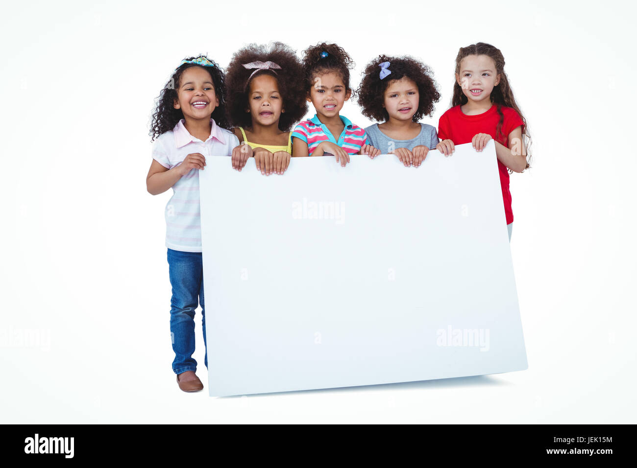 Cute girls holding big paper Stock Photo - Alamy