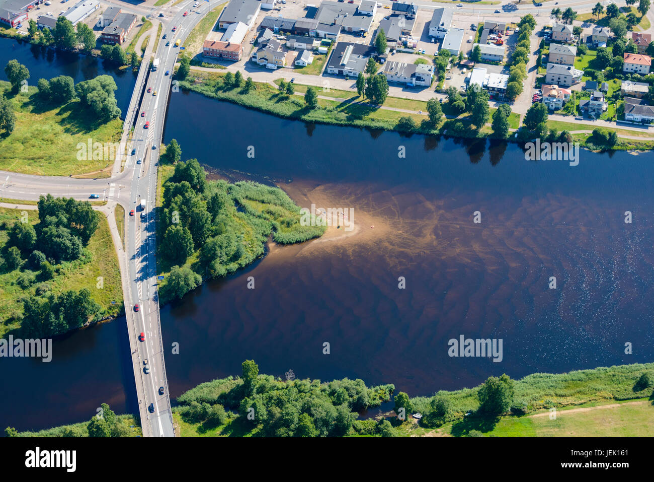 Aerial view of river flowing through city Stock Photo - Alamy