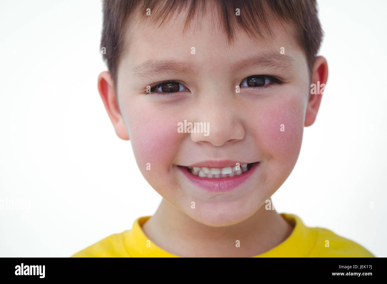 Cute boy smiling at the camera Stock Photo - Alamy
