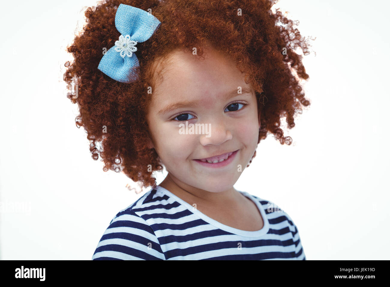Cute girl smiling at the camera Stock Photo - Alamy