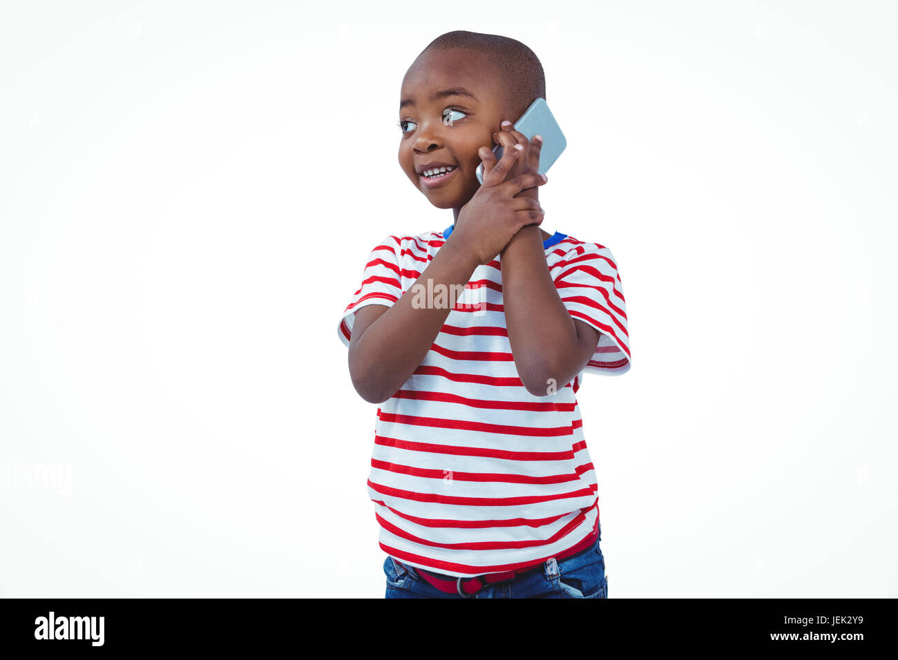 Standing boy on a phone call Stock Photo - Alamy