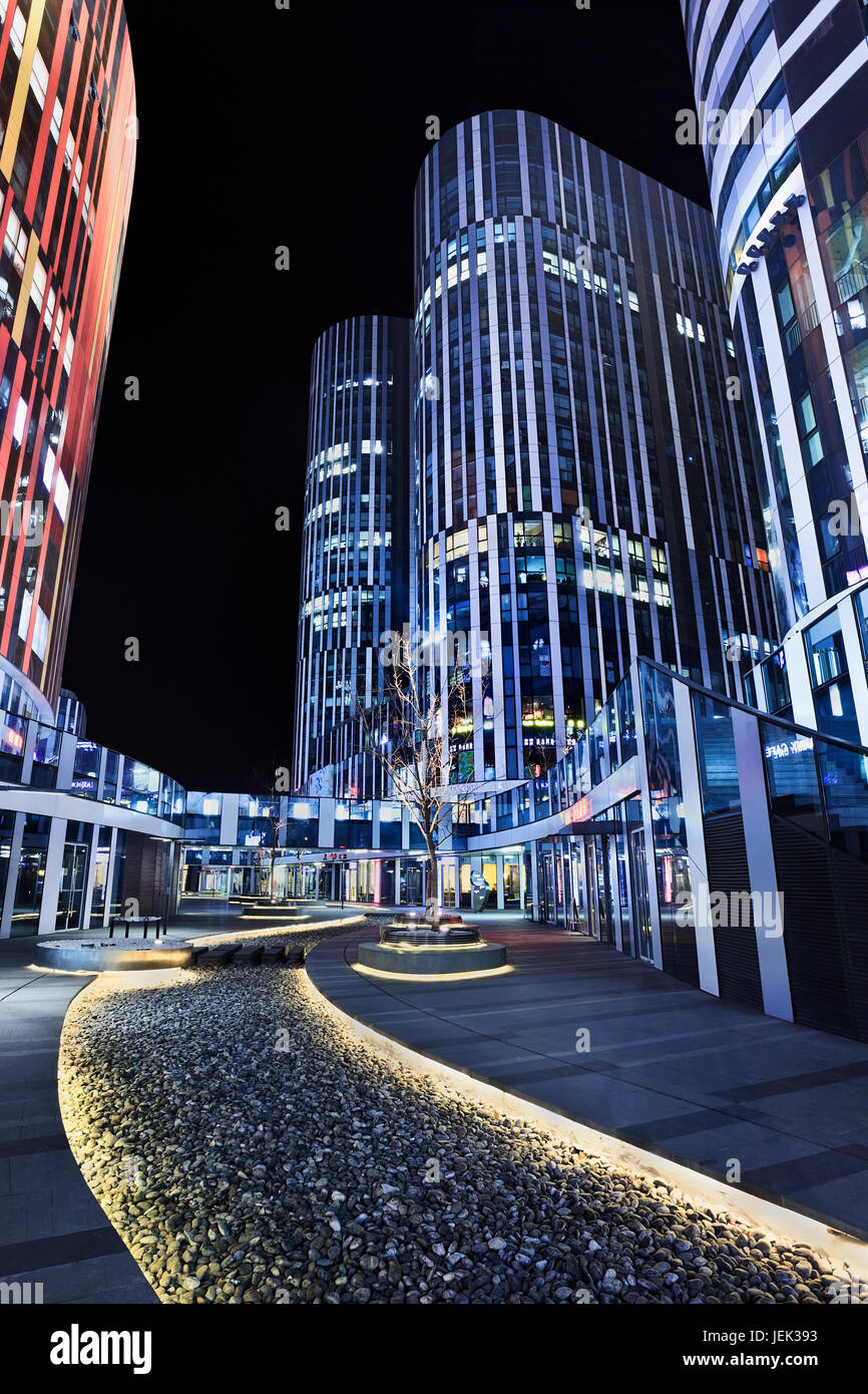 SOHO Sanlitun office area Beijing at night. SOHO Sanlitun is a mixed ...