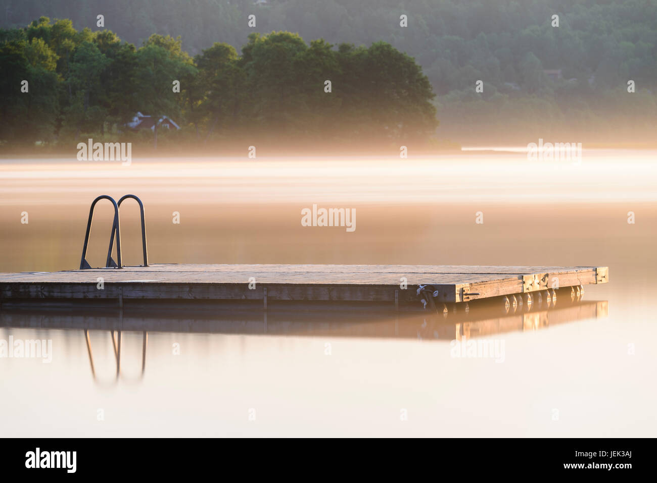 Jetty with ladder Stock Photo - Alamy