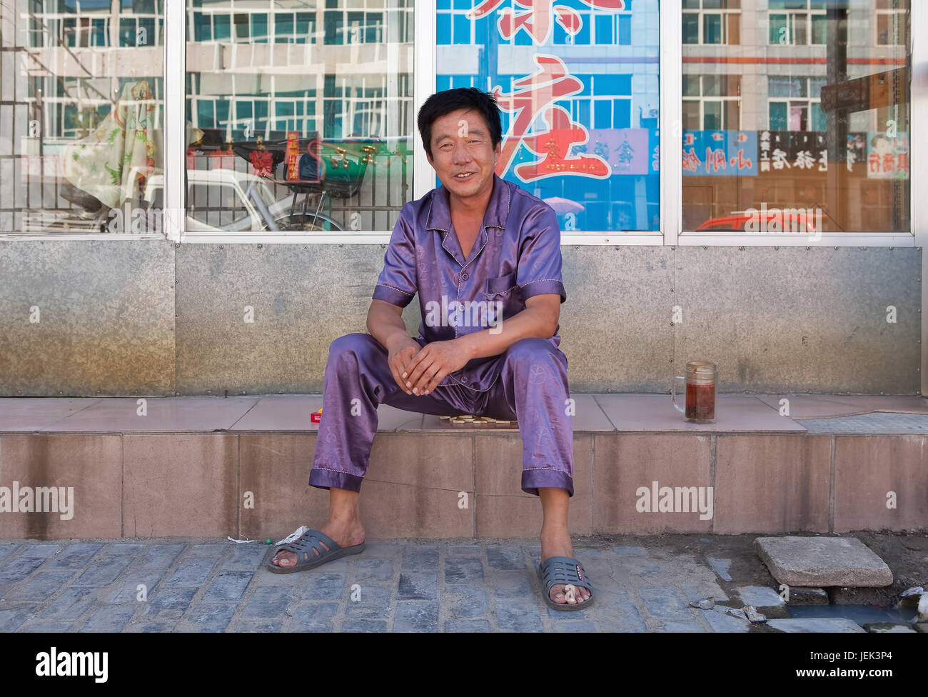 Man outside house night windows hi-res stock photography and images - Alamy