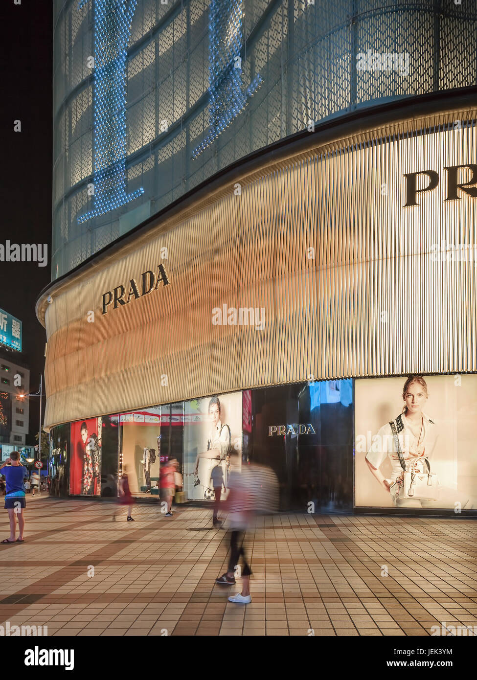 BEIJING-JULY 6, 2016. Prada flagship store exterior at night. Italian ...